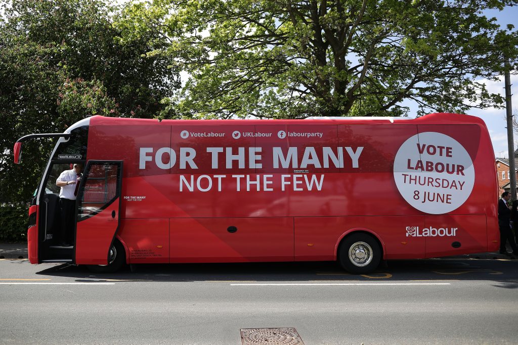 Labour's campaign bus arrives at Garforth Leisure Centre - First News Live!