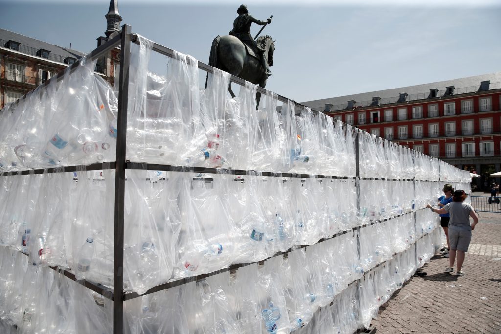 Plastic bottles and bags used to build a 'garbage labyrinth' in Madrid ...